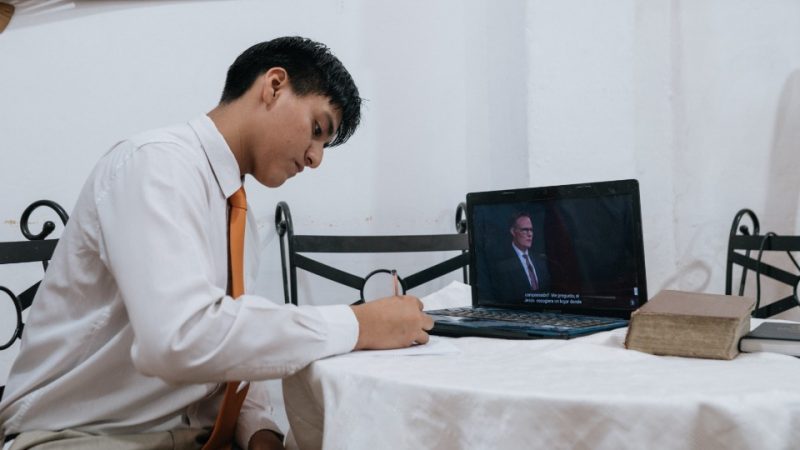 young-man-studying-lds-general-conference | LDS365: Resources from the ...